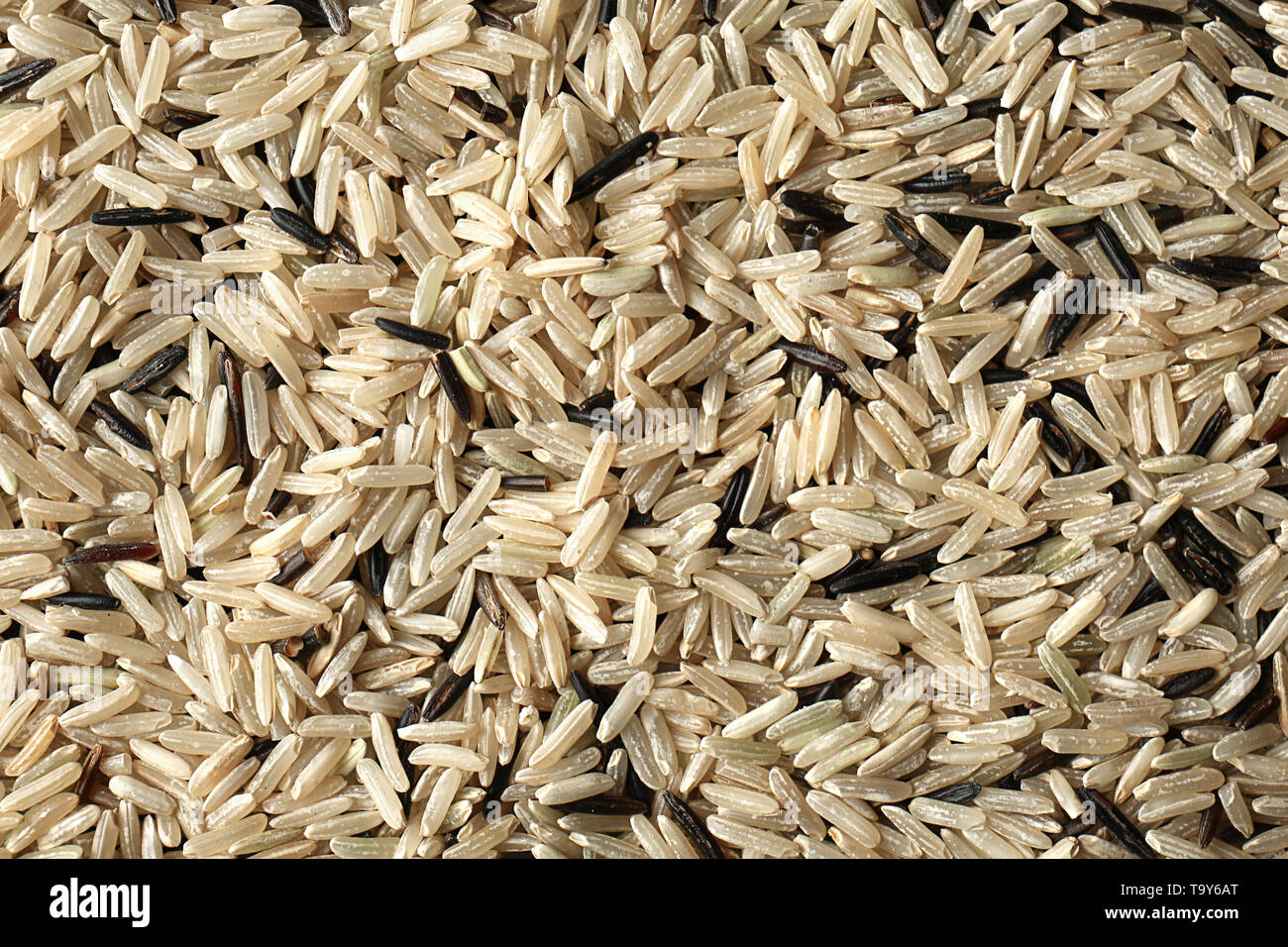 Pile of dry rice, closeup Stock Photo - Alamy