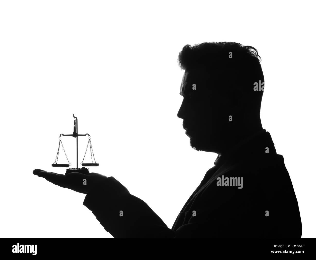 Silhouette of man with scales of justice on white background Stock ...