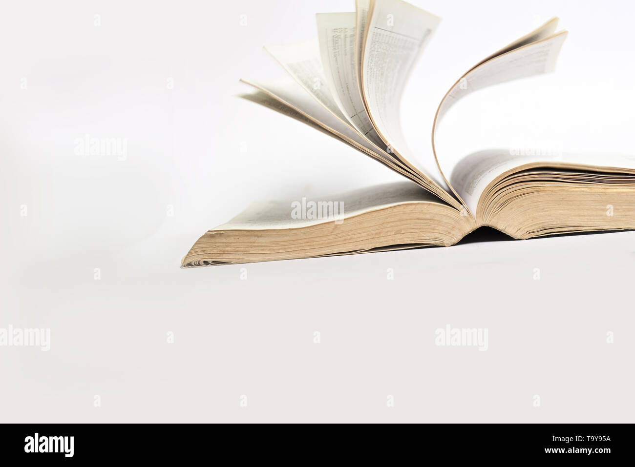 open book isolated on white background Stock Photo - Alamy
