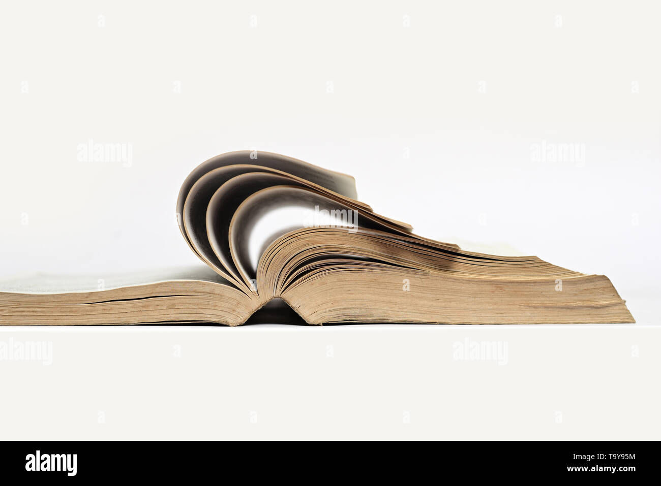 open book isolated on white background Stock Photo - Alamy