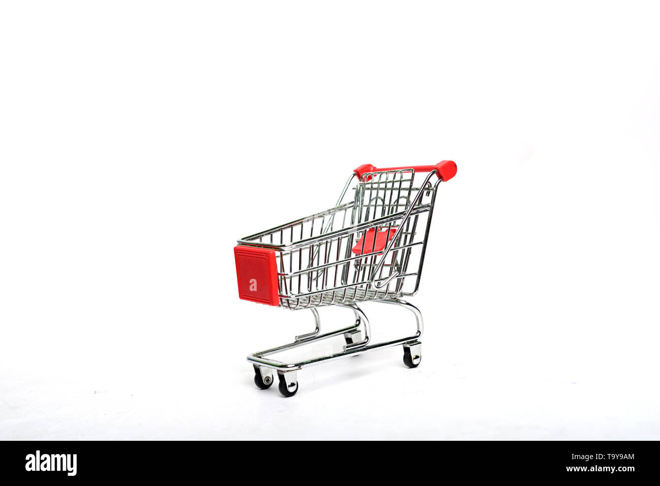 Shopping cart trolley isolated on white background Stock Photo - Alamy