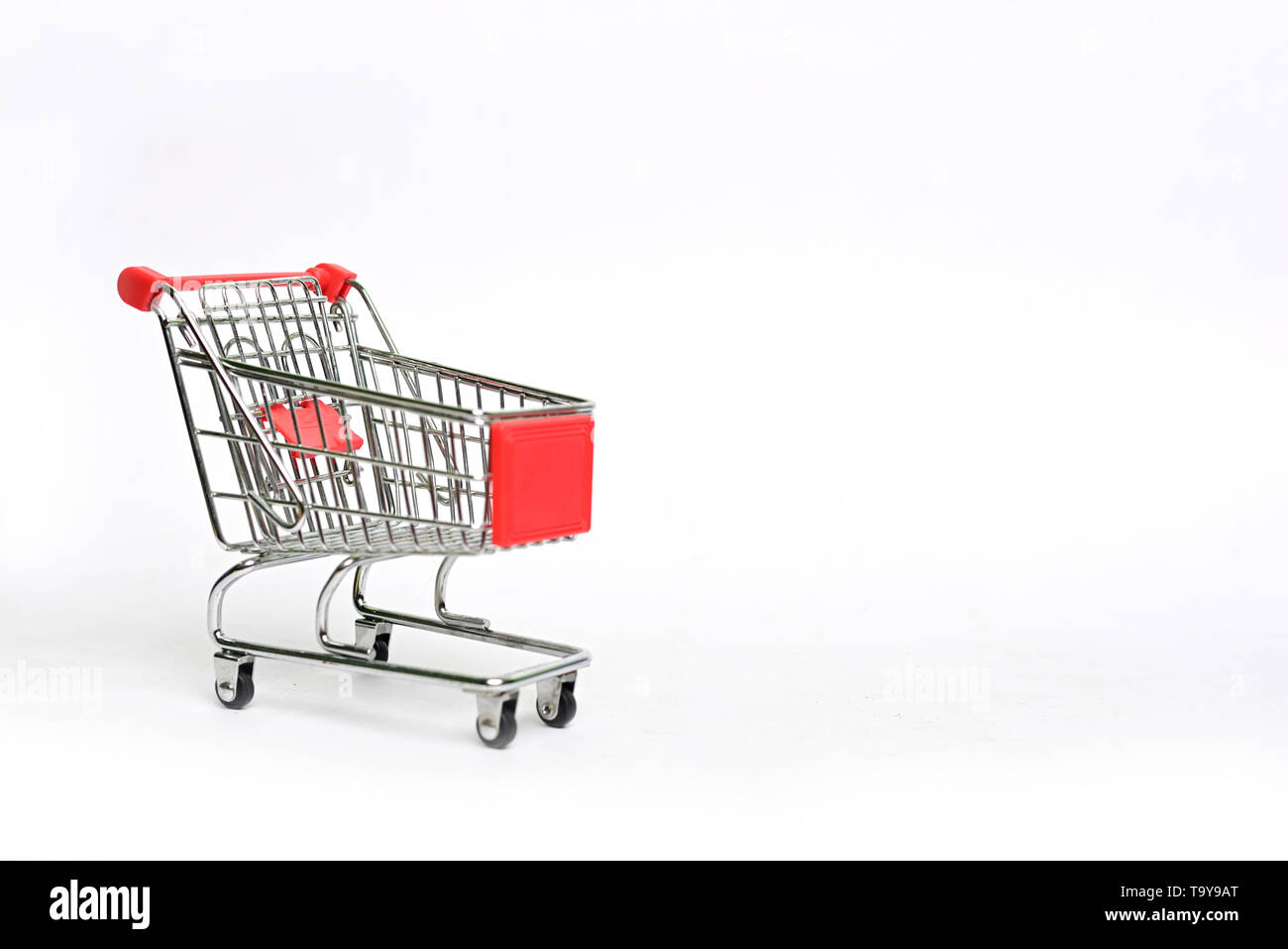 Shopping cart trolley isolated on white background Stock Photo - Alamy