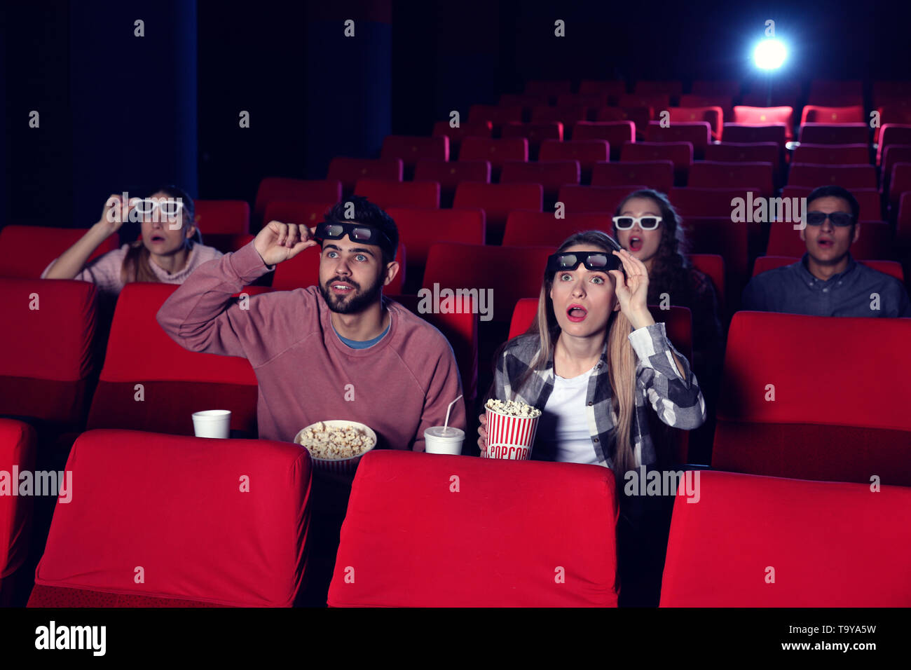 People watching movie in cinema Stock Photo - Alamy