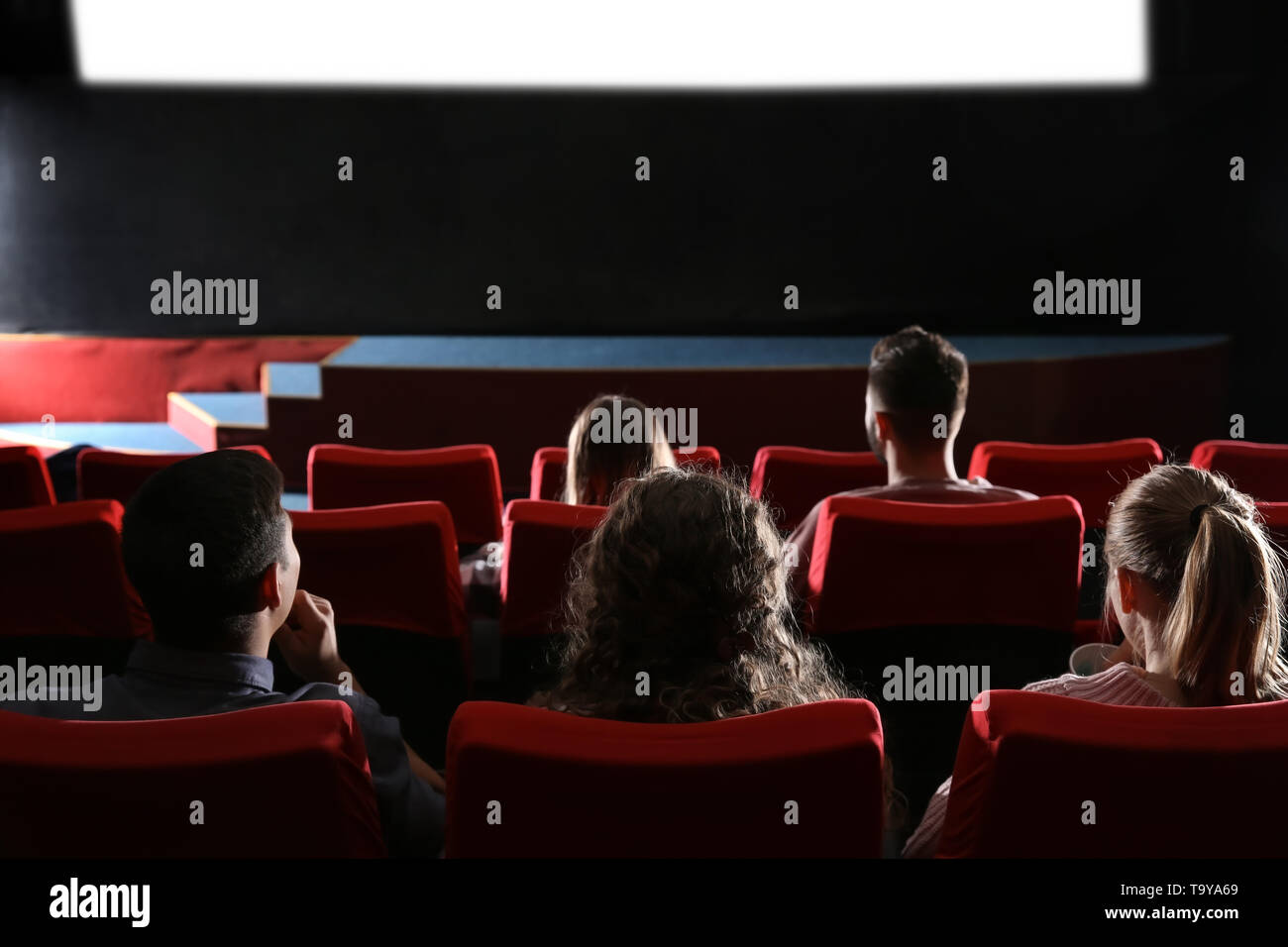 People watching movie hall hi-res stock photography and images - Alamy