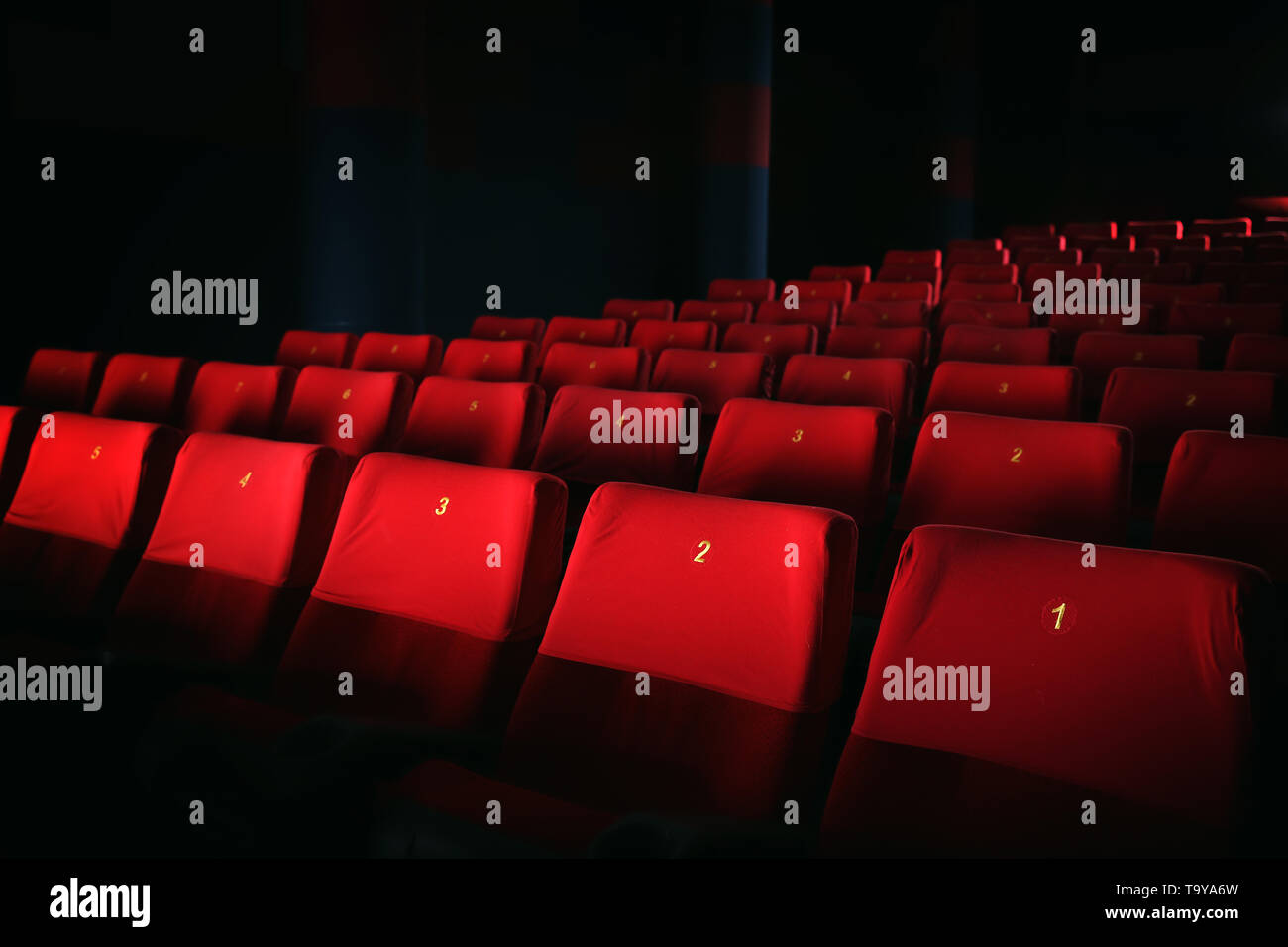 Empty cinema with comfortable chairs Stock Photo - Alamy