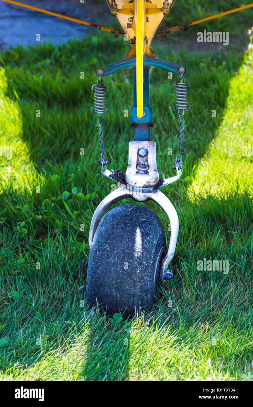 Tail wheel and horizontal stabilizers, rear view, of single engine ...