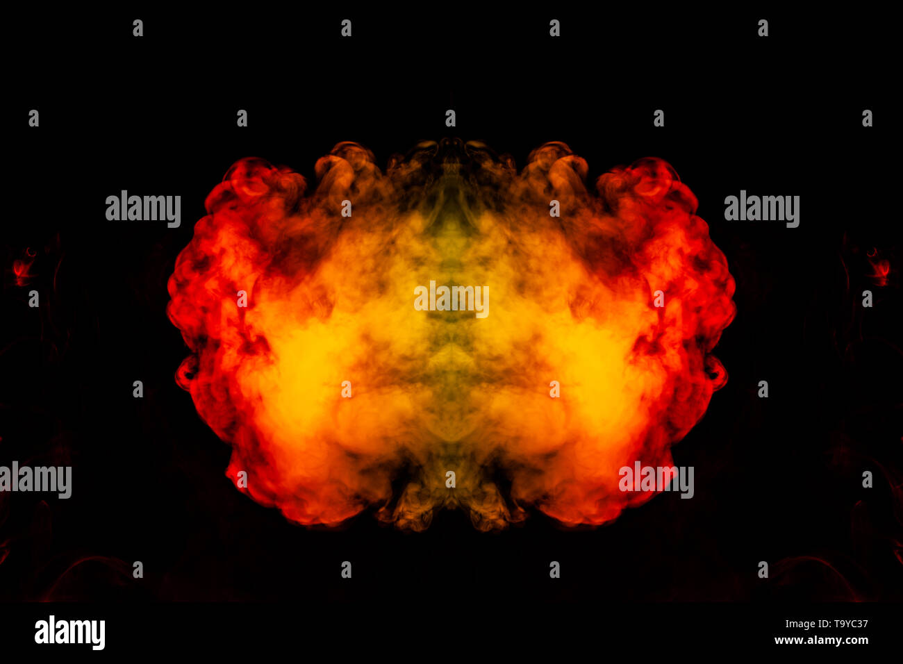 A blob of red and orange smoke in the form of a wavy pattern in the ...