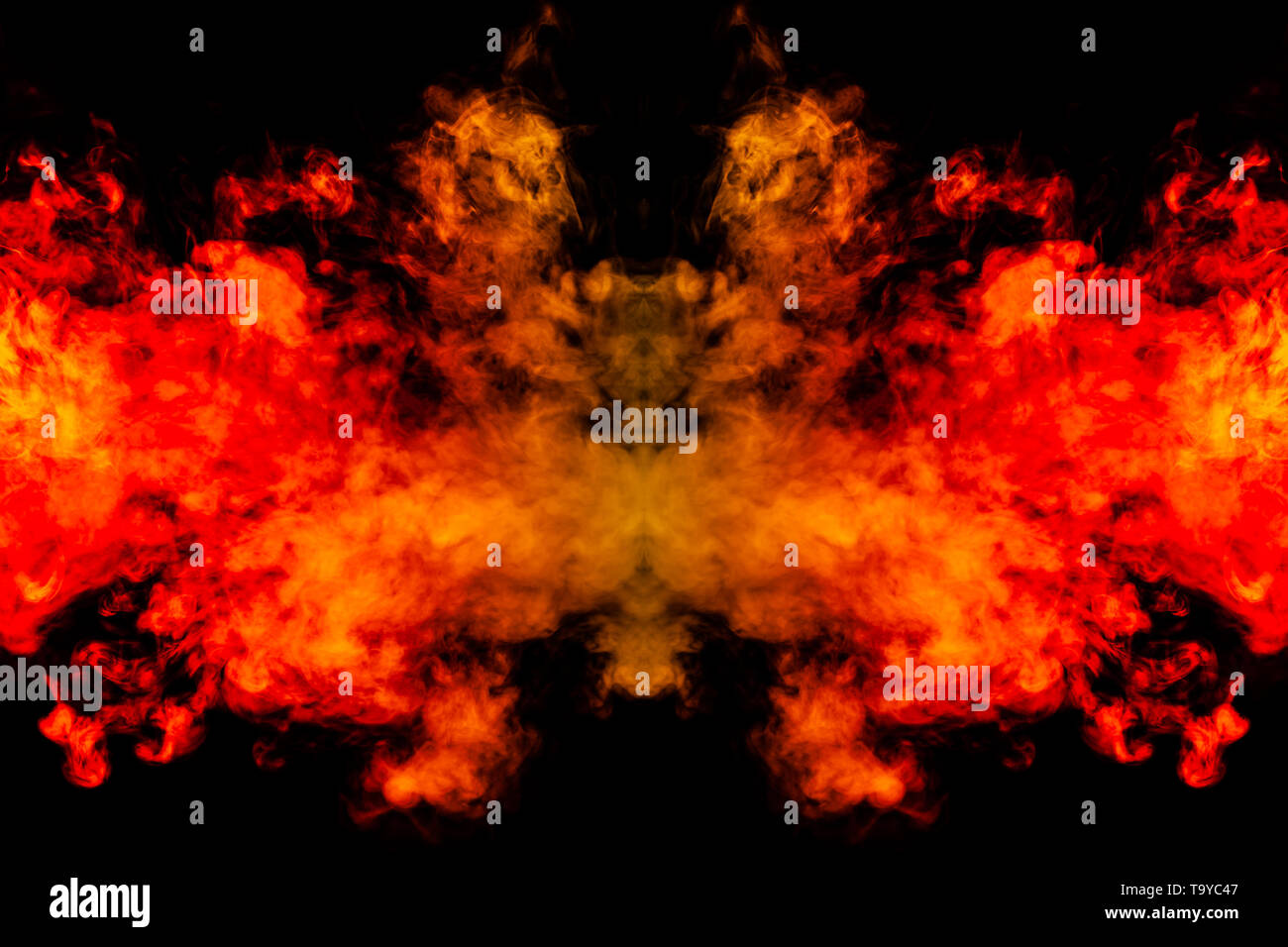 Smoke of different orange and red colors in the form of horror in the ...