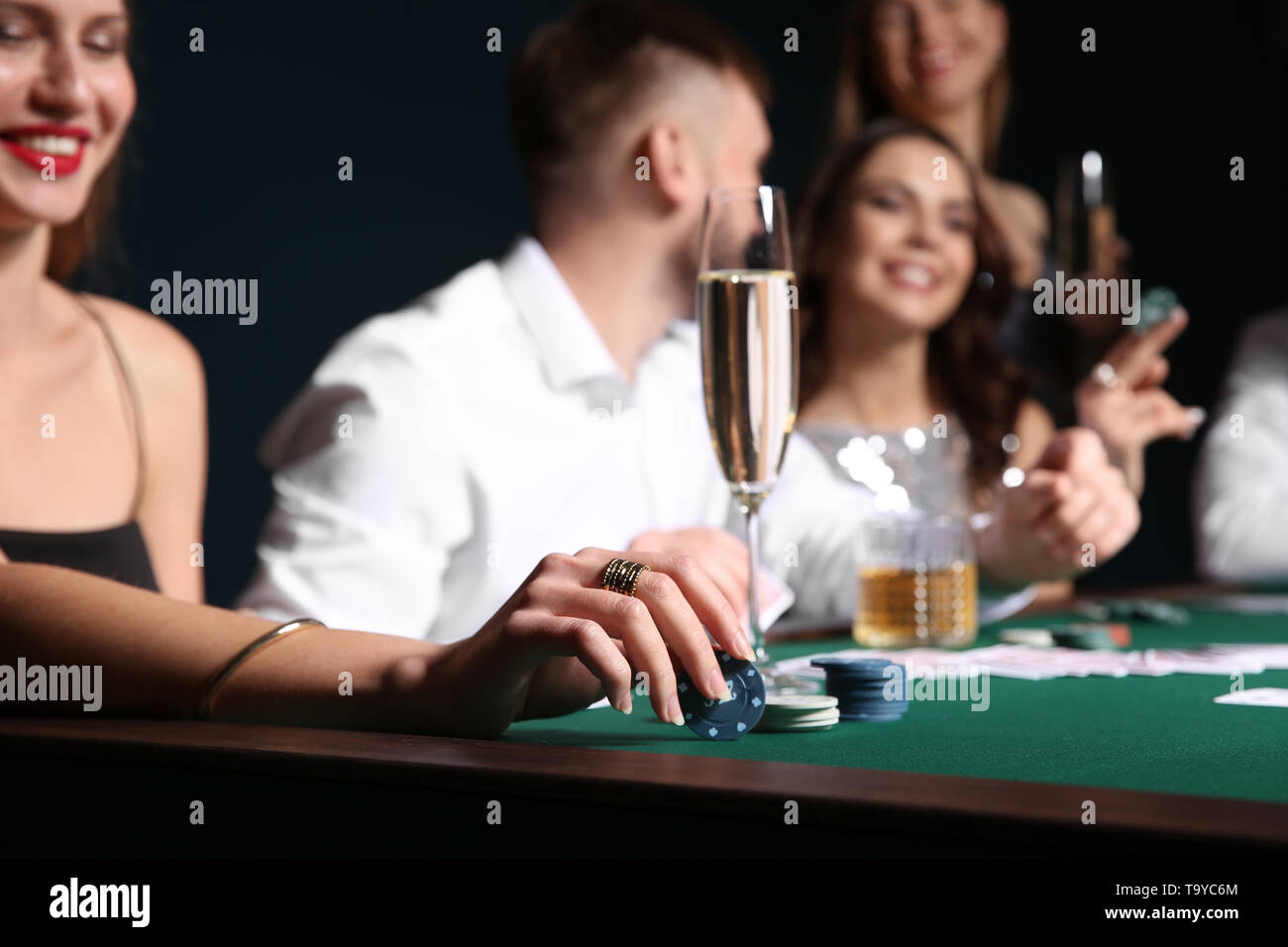 People sitting poker table playing hi-res stock photography and images ...