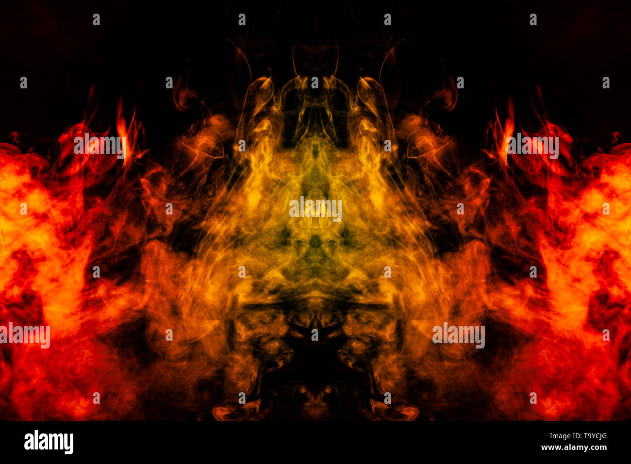 Smoke of different orange and red colors in the form of horror in the ...