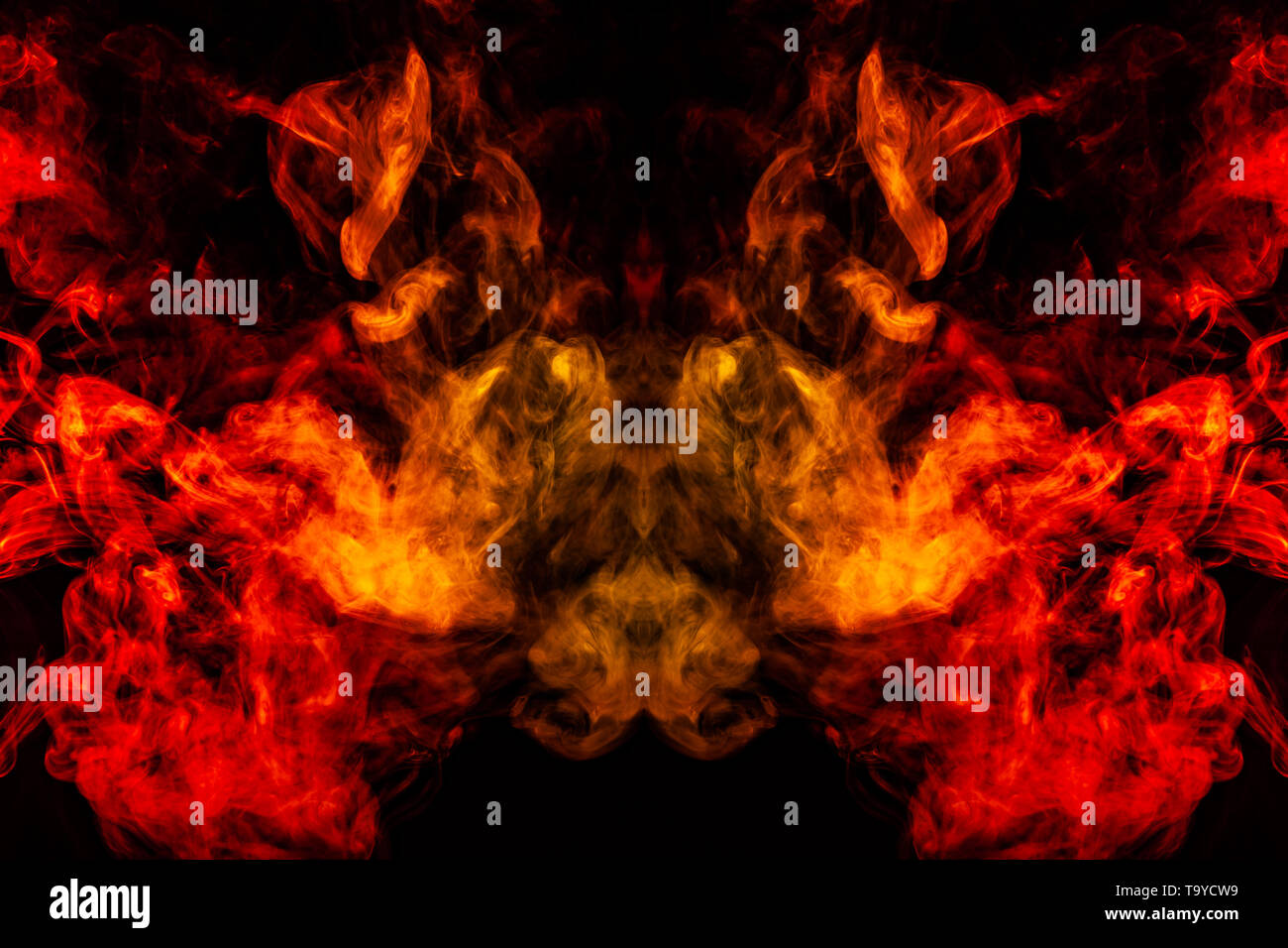 Smoke of different orange and red colors in the form of horror in the ...