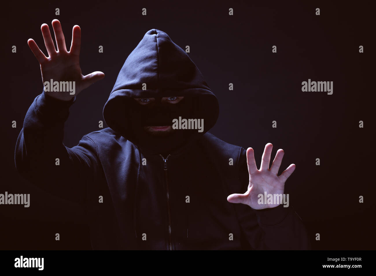 Professional hacker on dark background. Concept of internet theft Stock ...