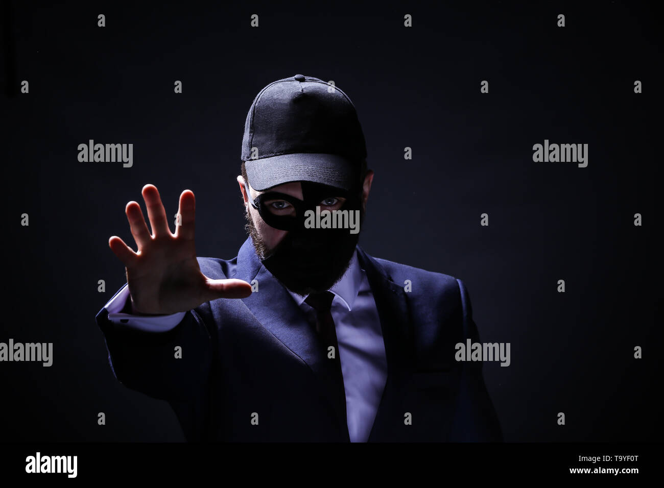 Professional hacker on dark background. Concept of internet theft Stock ...