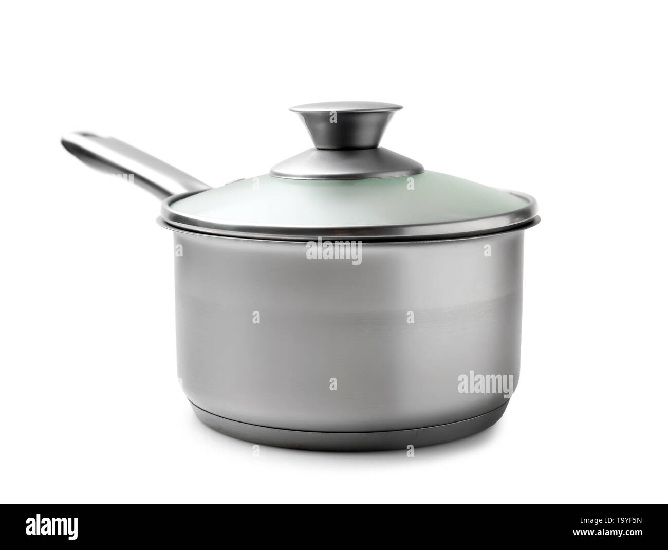 Stainless steel saucepan on white background Stock Photo - Alamy