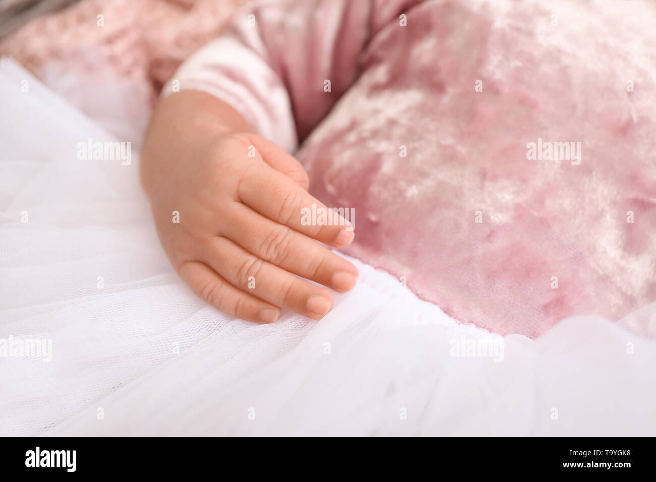 Tiny hand of cute little baby, closeup Stock Photo - Alamy