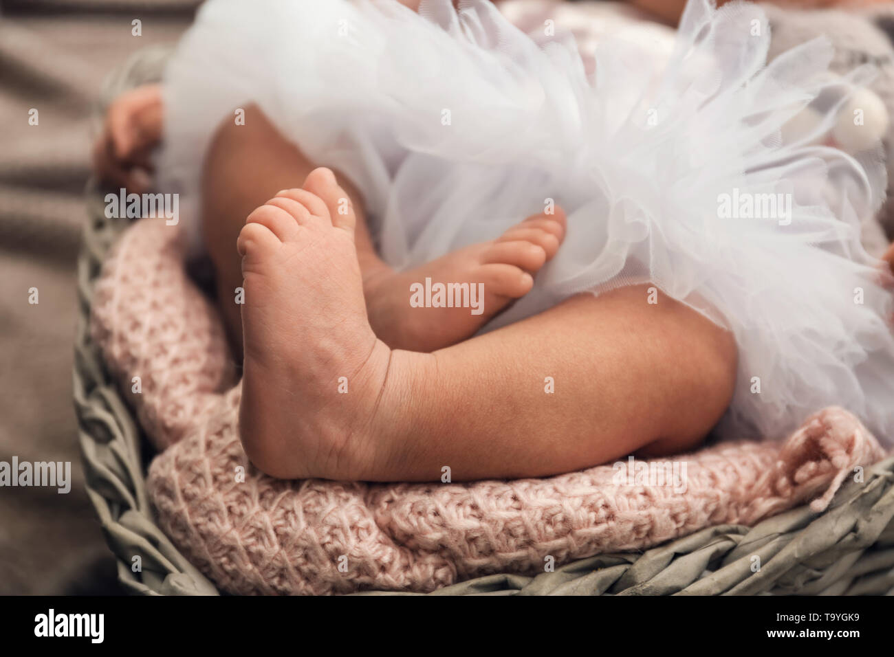 Tiny feet of cute little baby, closeup Stock Photo - Alamy
