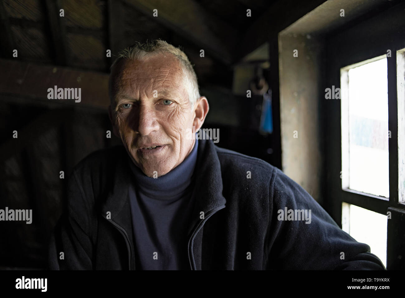 Portraits of a Dutch miller at his windmill in the Netherlands Stock ...