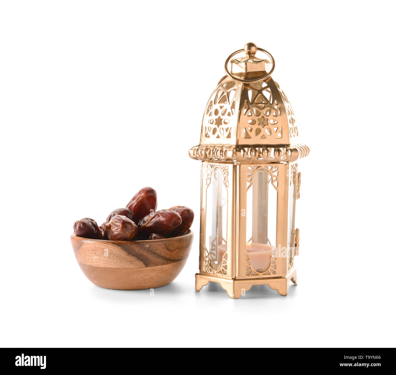 Muslim lamp as Ramadan symbol and dates on white background Stock Photo ...
