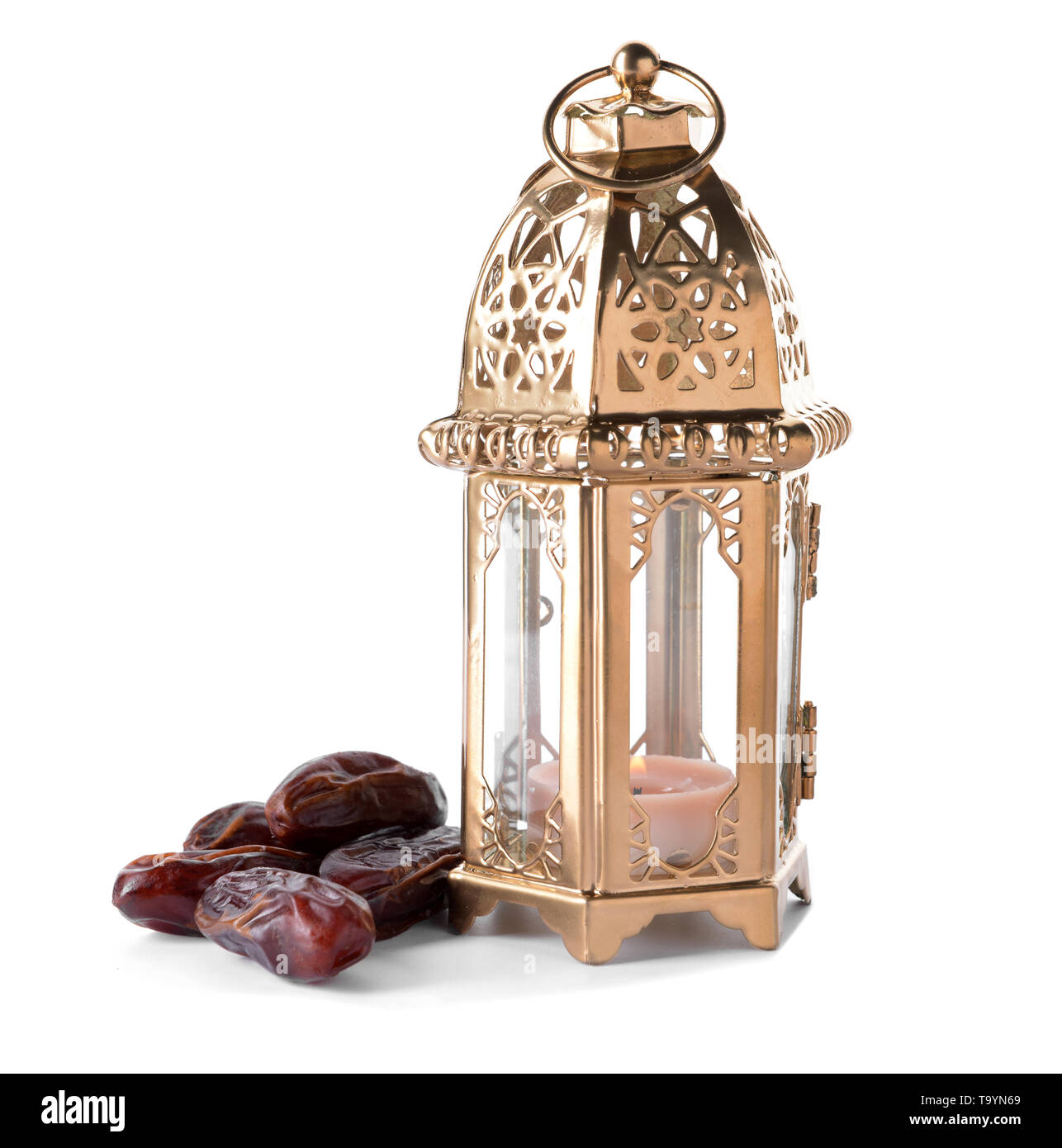 Muslim lamp as Ramadan symbol and dates on white background Stock Photo ...