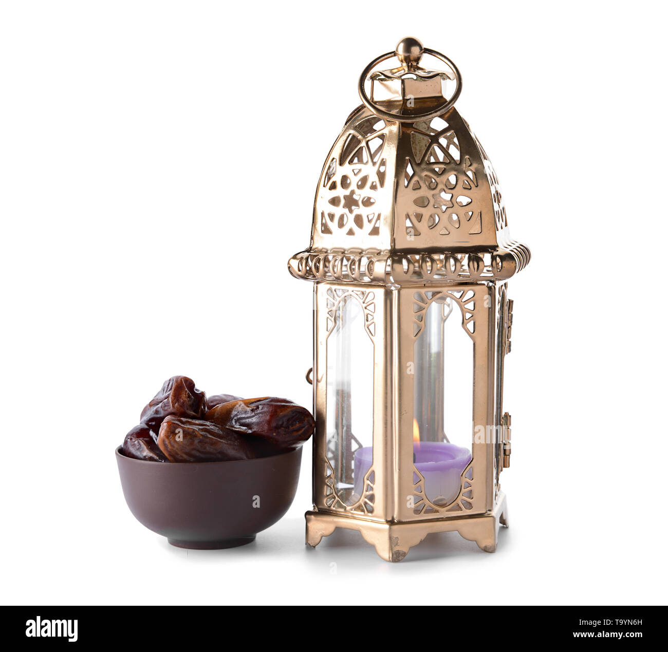 Muslim lamp as Ramadan symbol and dates on white background Stock Photo ...