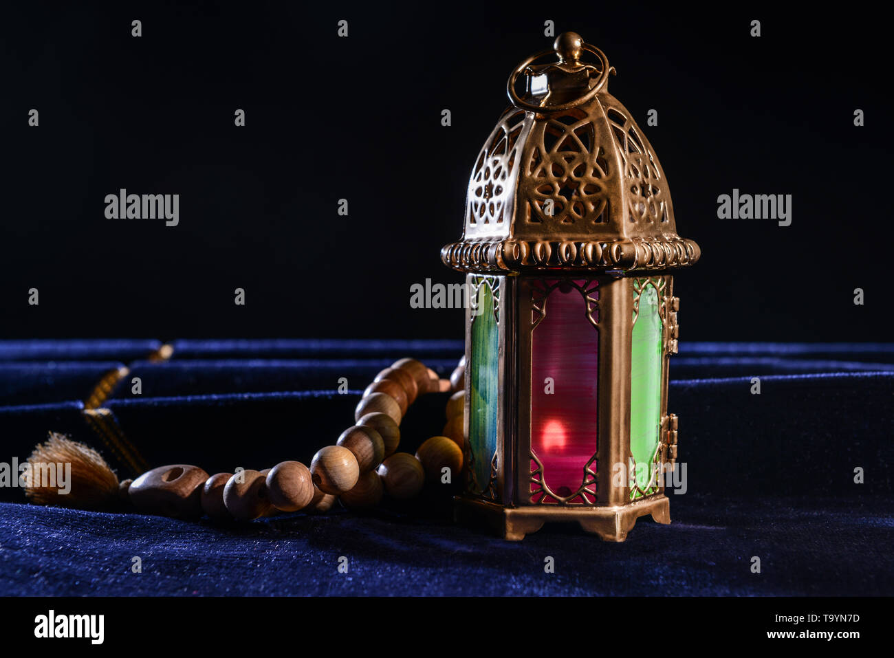 Muslim lamp as Ramadan symbol and tasbih on dark background Stock Photo ...