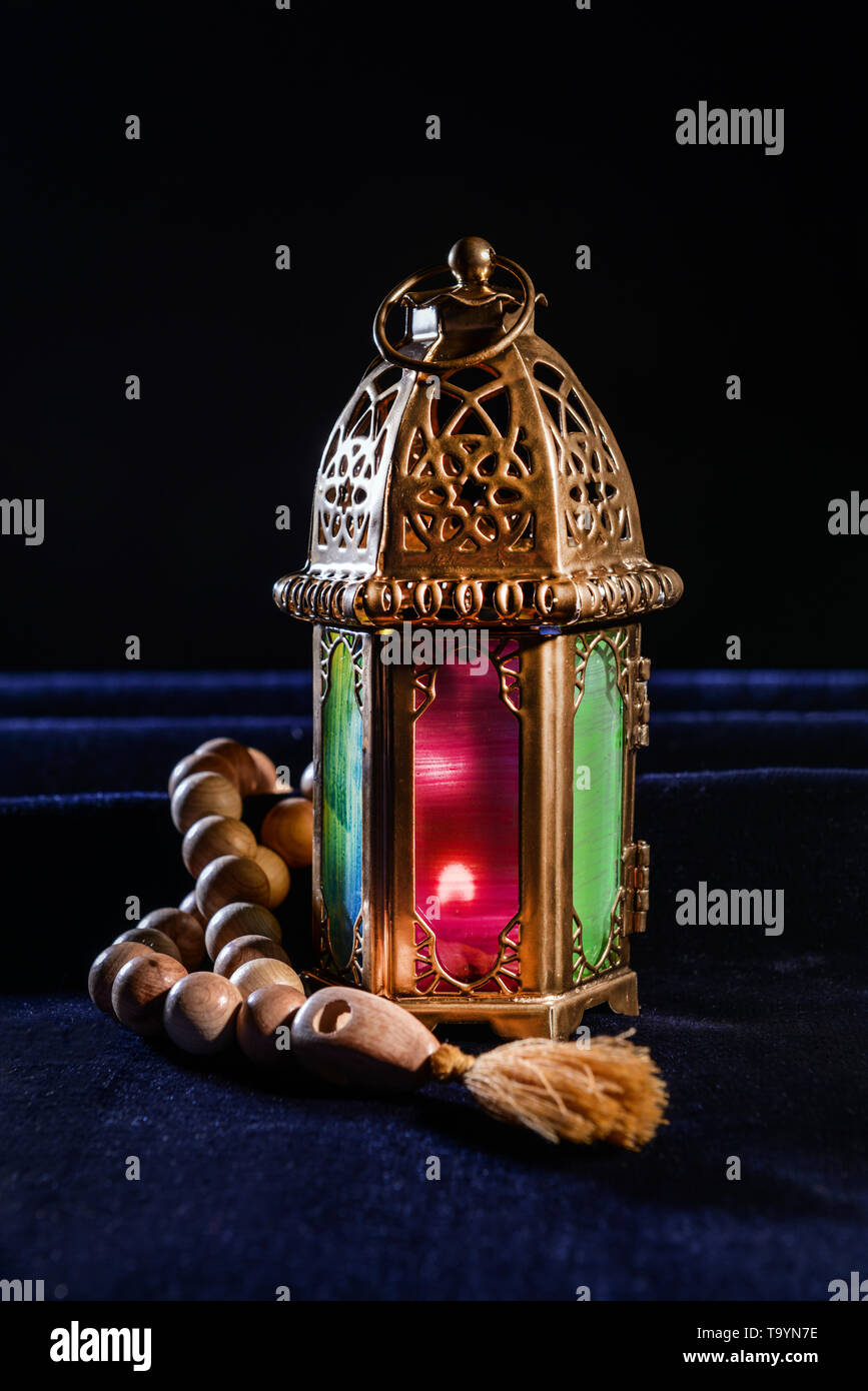 Muslim lamp as Ramadan symbol and tasbih on dark background Stock Photo ...