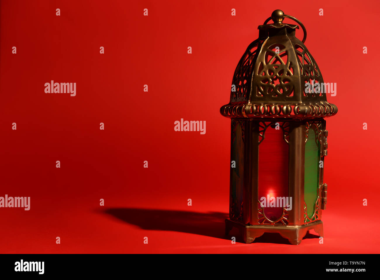 Muslim lamp as Ramadan symbol on color background Stock Photo - Alamy