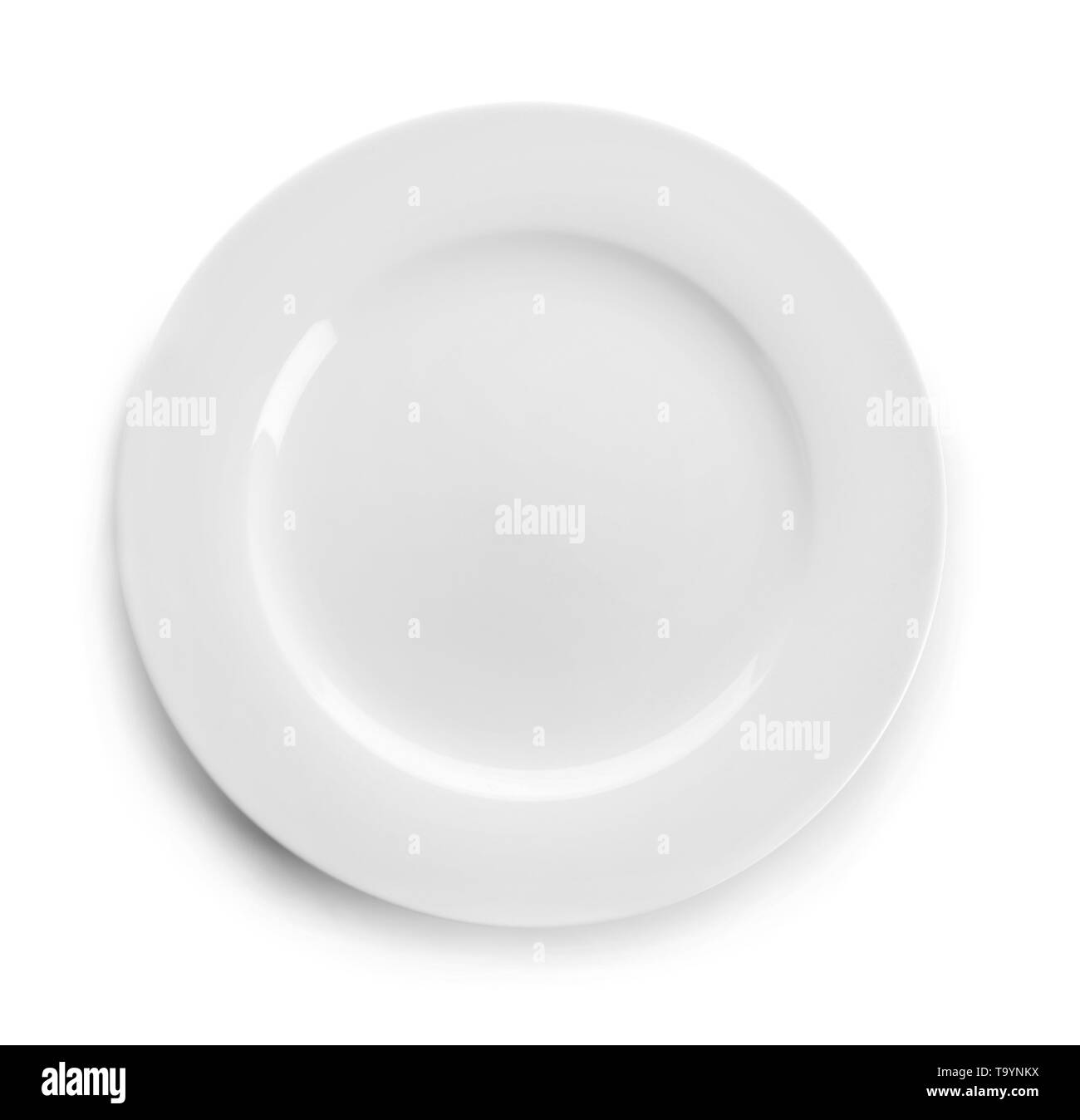 Clean empty plate on white background Stock Photo - Alamy