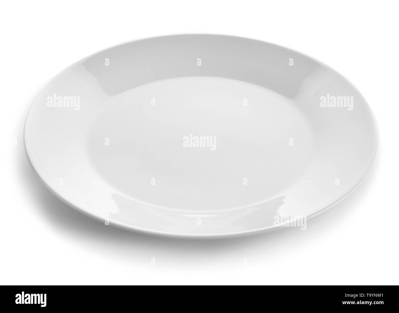 Clean empty plate on white background Stock Photo - Alamy
