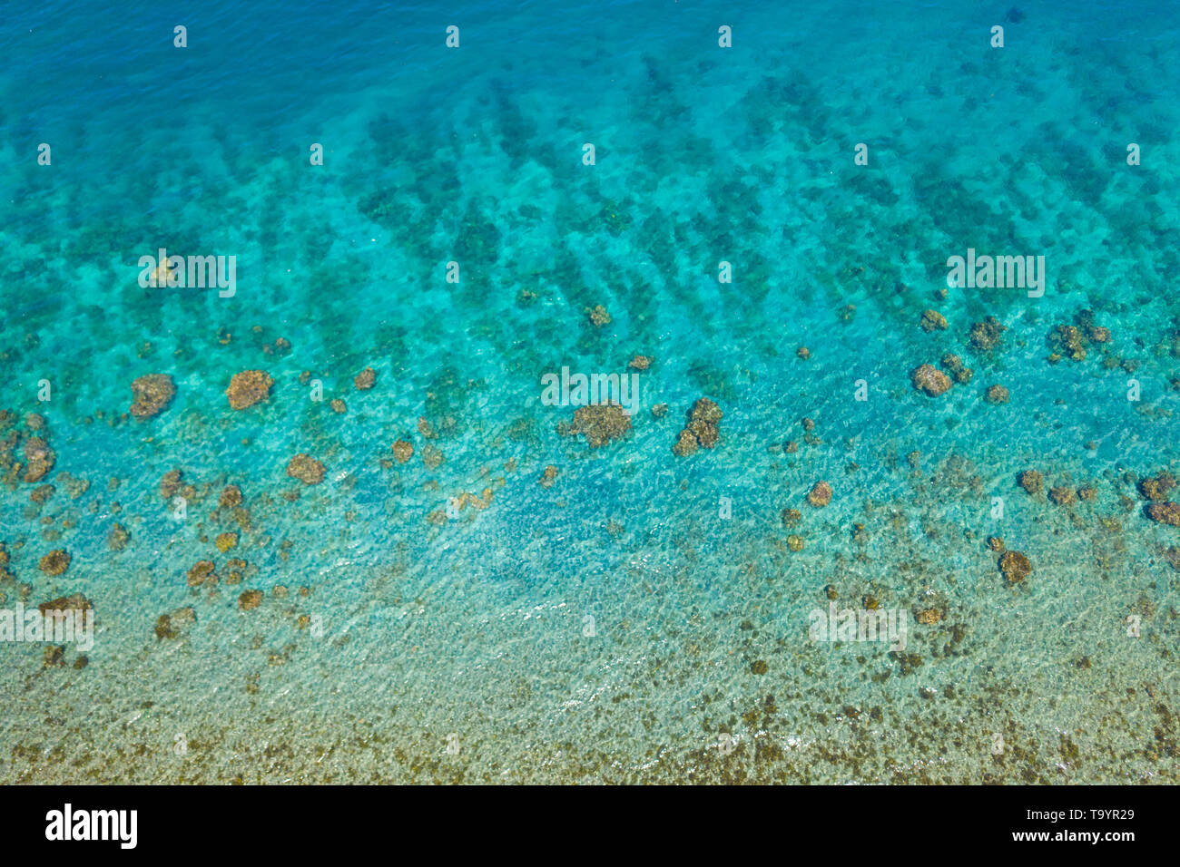 Transparent sea water, top view. Aerial view of calm sea water. Top ...
