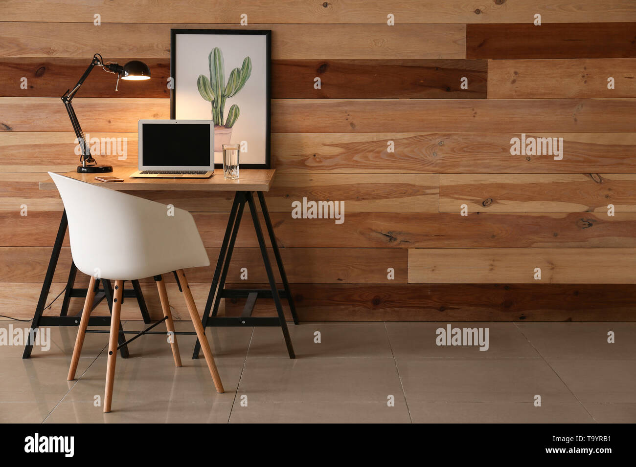 Interior of room with comfortable workplace Stock Photo - Alamy