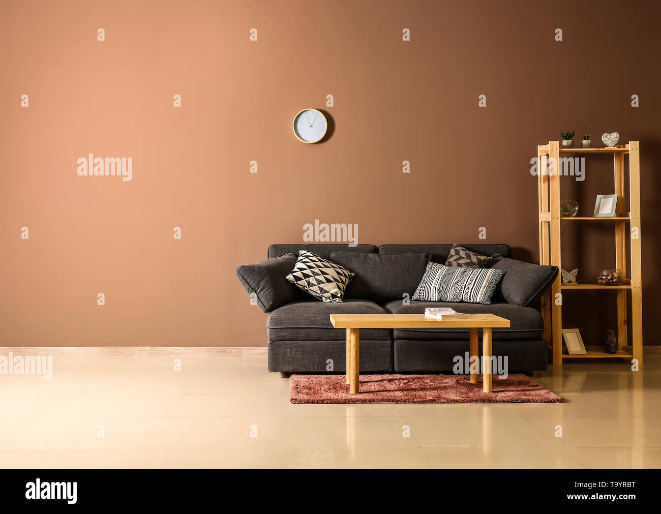 Interior of room with comfortable sofa Stock Photo - Alamy