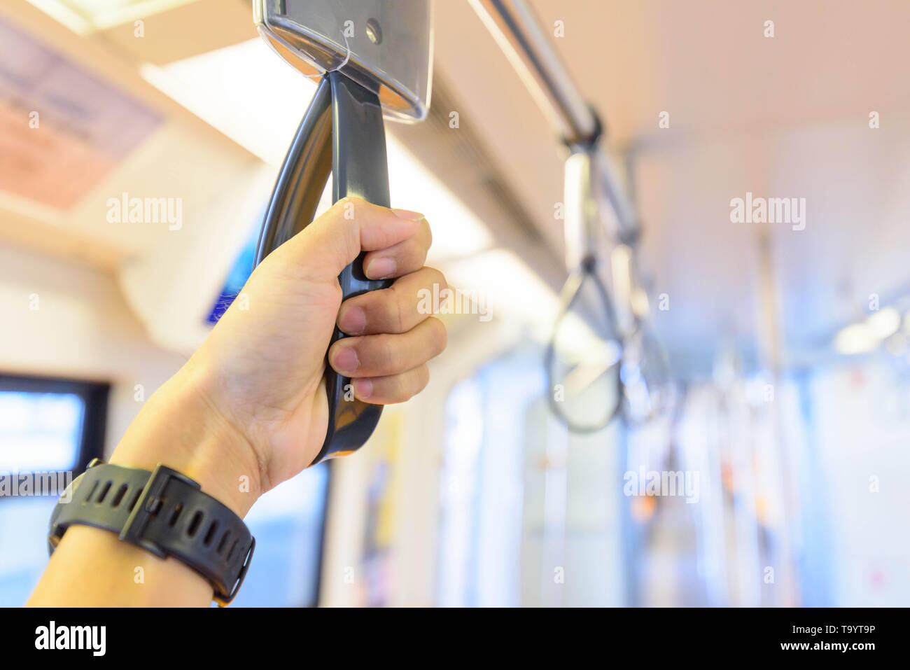 use handle in train in sky train for transport Stock Photo - Alamy
