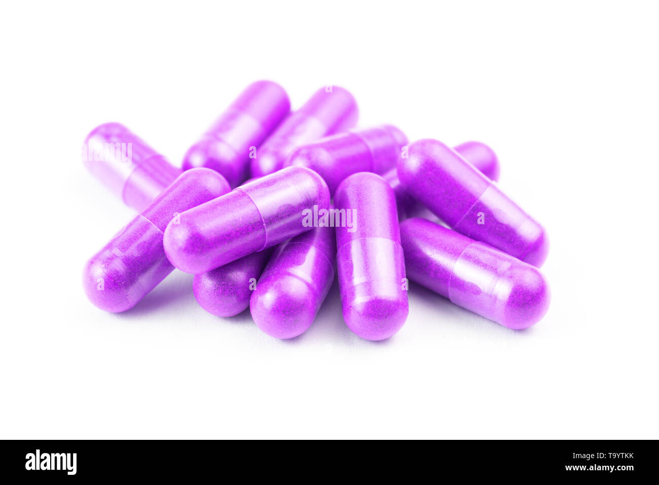 Pile of capsules purple Cut Out Stock Images & Pictures - Alamy
