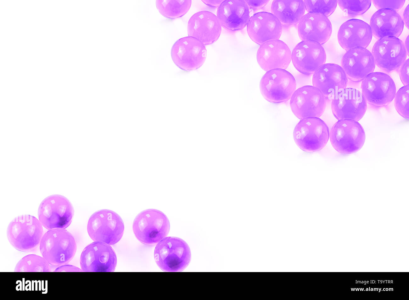 proton purple spherical ball capsules with selective focus isolated on ...