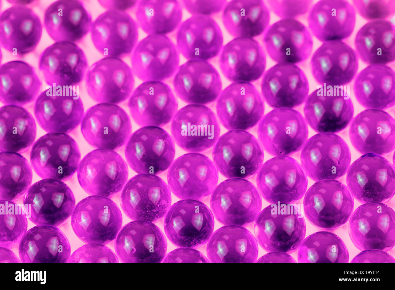 proton purple spherical ball capsules selective focus weird abstract ...