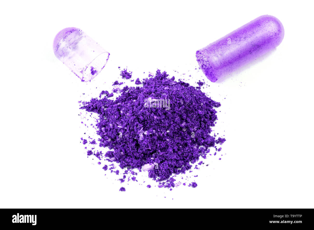opened proton purple color organic med capsule isolated on white ...