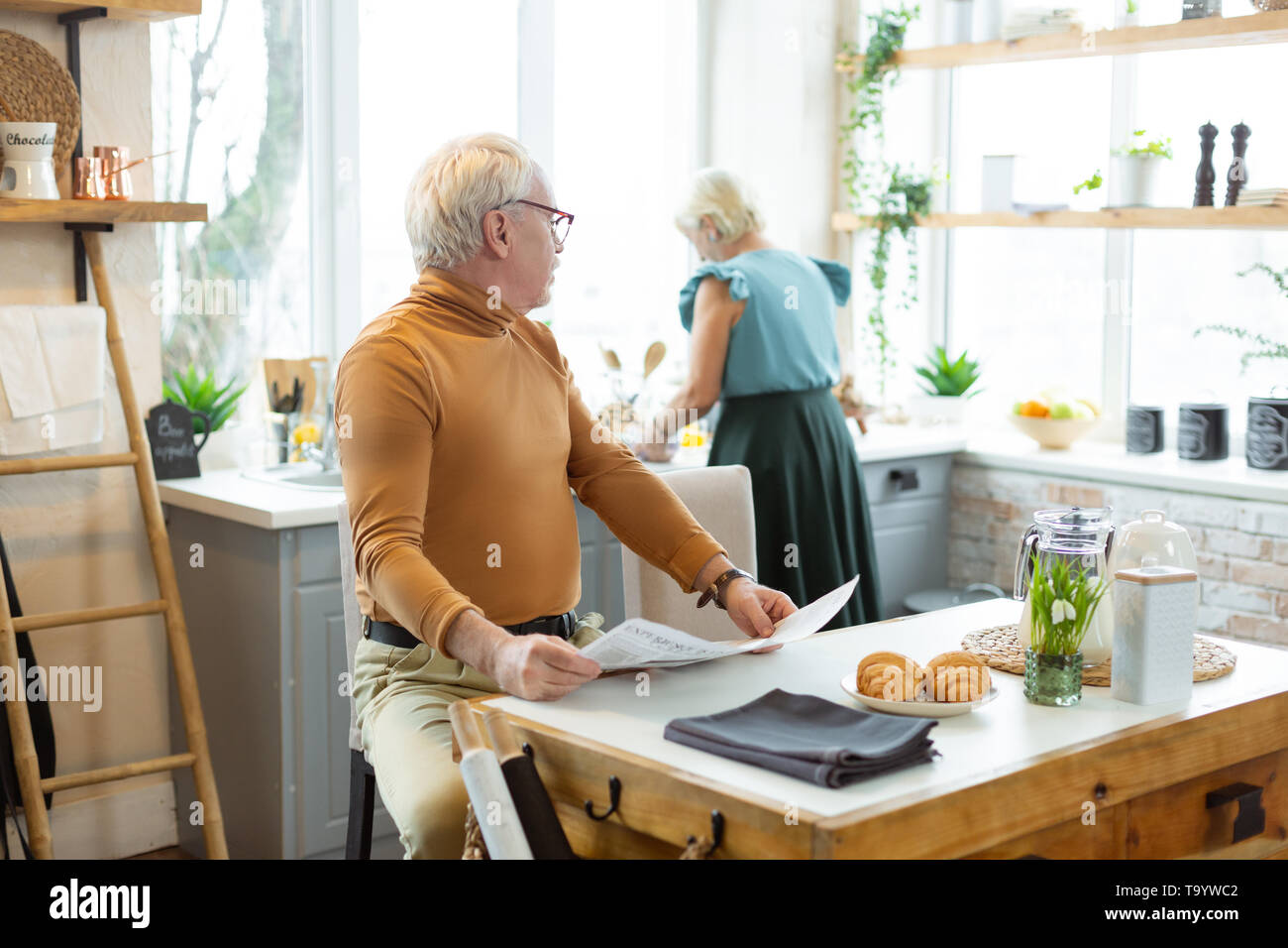 Mature woman cooking busy hi-res stock photography and images - Alamy