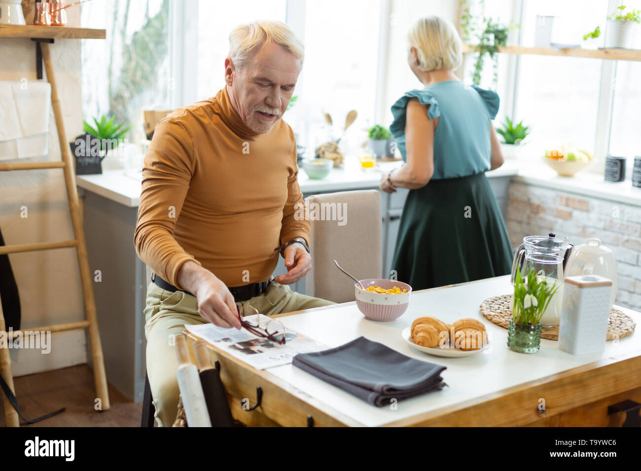 Nice couple cooking in kitchen hi-res stock photography and images - Alamy