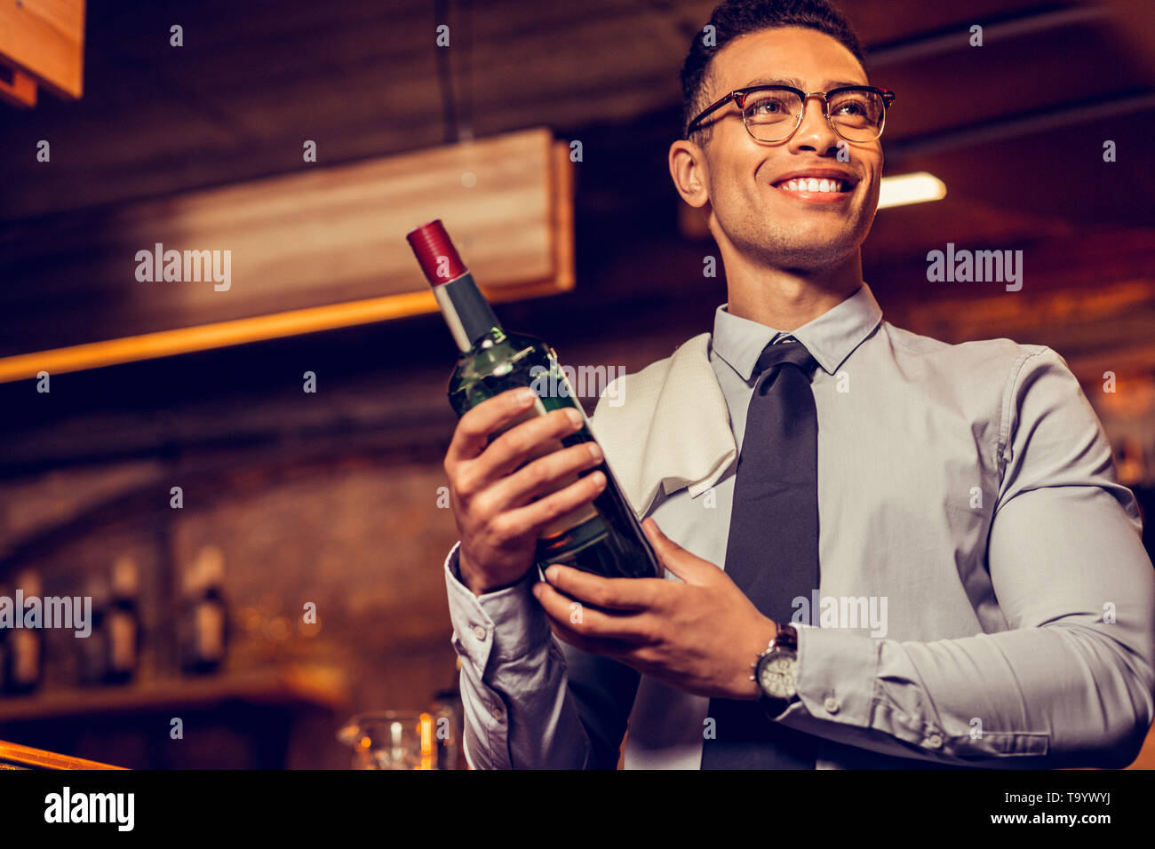 Businessman opening his first bar smiling while feeling excited Stock ...
