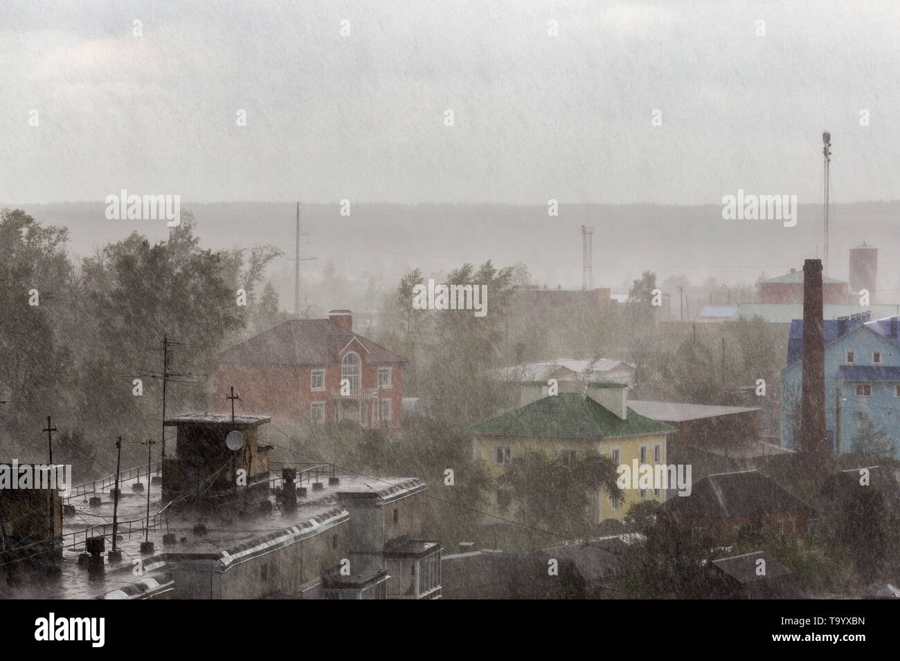 russian suburbs roofs under heavy rain telephoto shot Stock Photo - Alamy