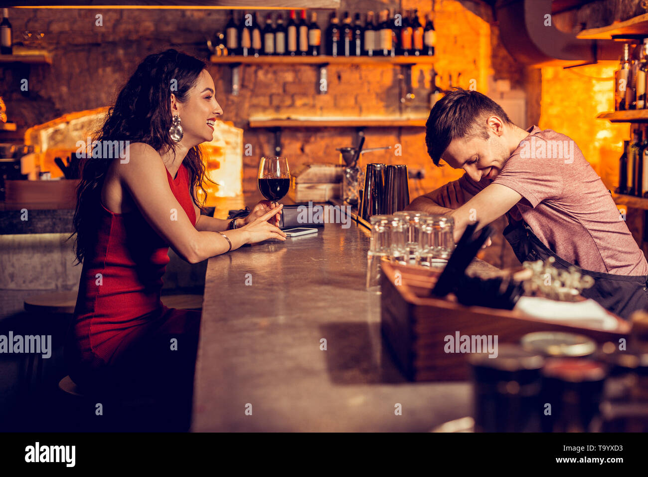 Curly haired woman laughing in hi-res stock photography and images - Alamy