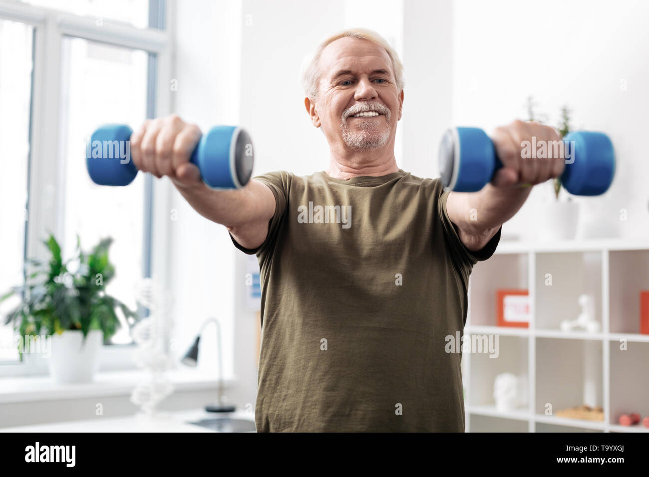 Positive nice man enjoying his healthy lifestyle Stock Photo - Alamy