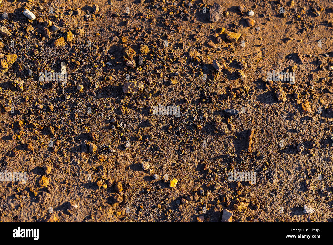 abstract dry mud background with small rocks and selective focus Stock ...