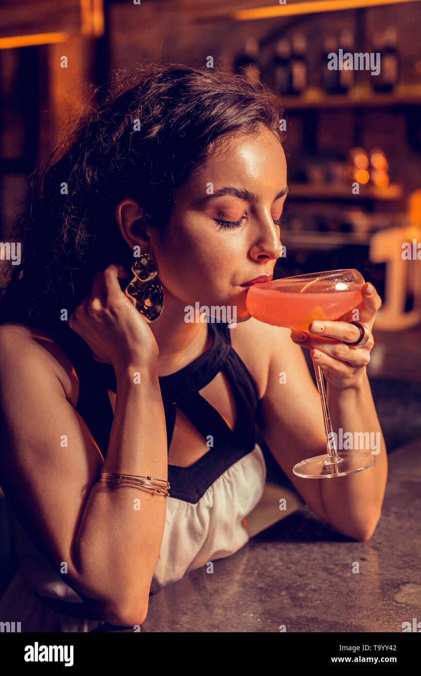 Beautiful woman with nice makeup drinking alcohol cocktail Stock Photo ...