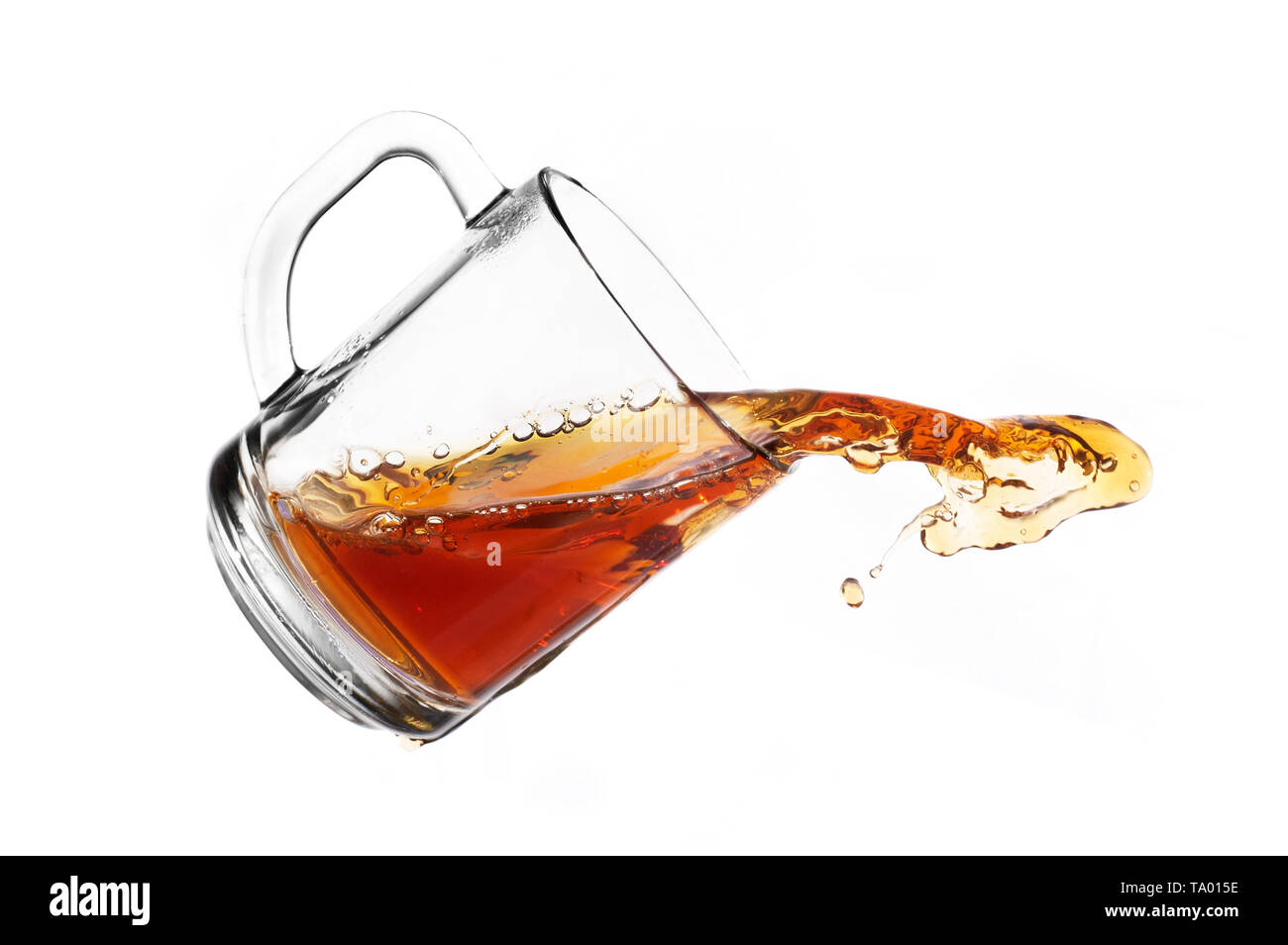 tea splash in glass cup isolated Stock Photo - Alamy