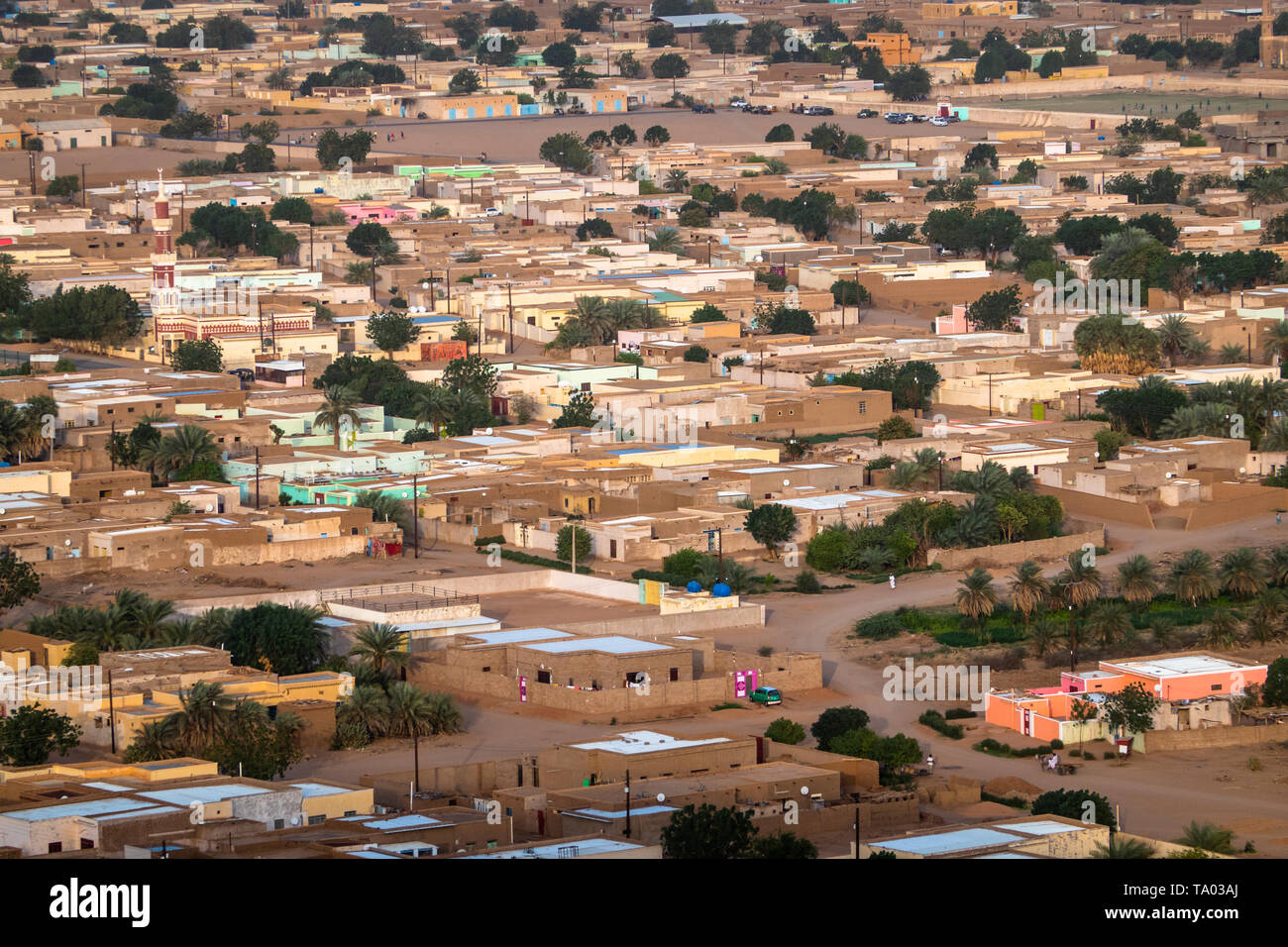 Aerial view of a typical village in Sudan near the Nile, with flat loam ...
