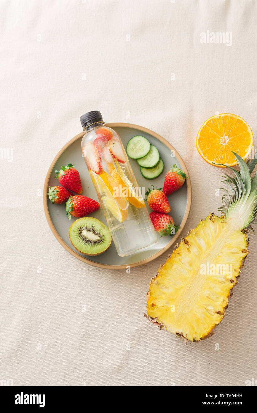 Detox fruit infused flavored water. Refreshing summer homemade cocktail ...