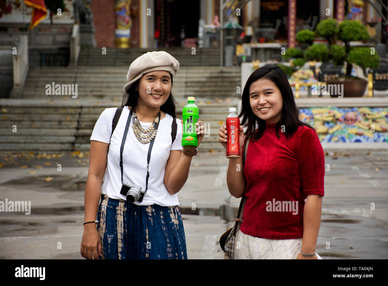 Chinese people and traveler thai women posing with beverage chinese ...