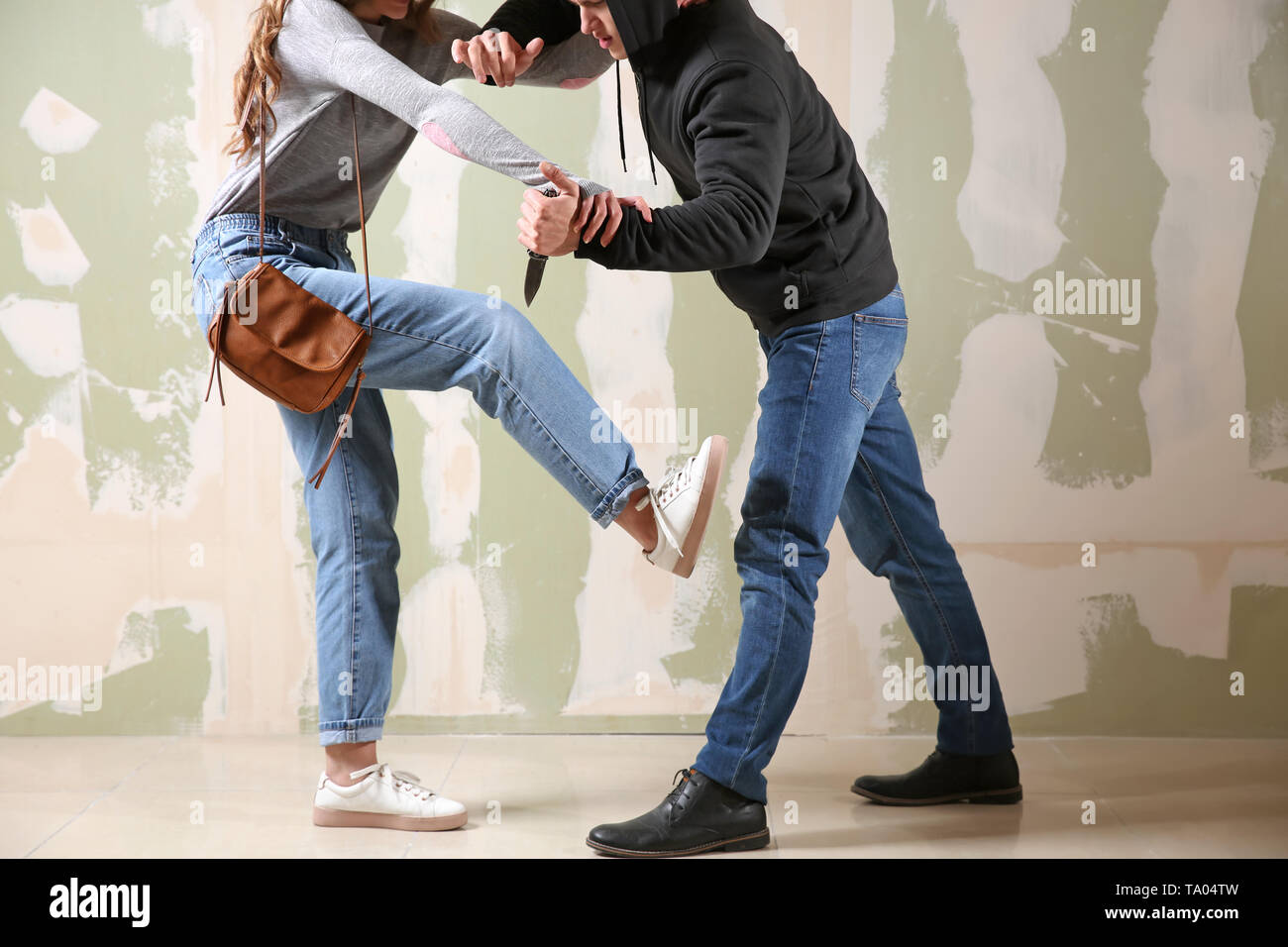 Protection from harm woman concept hi-res stock photography and images ...